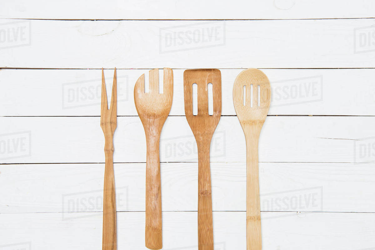 Top view of various wooden spatulas on white tabletop - Royalty-free ...