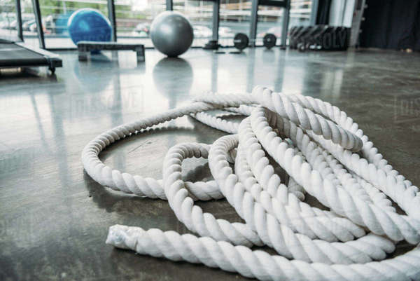 Close-up shot of training rope on floor at gym - Royalty-free Stock ...