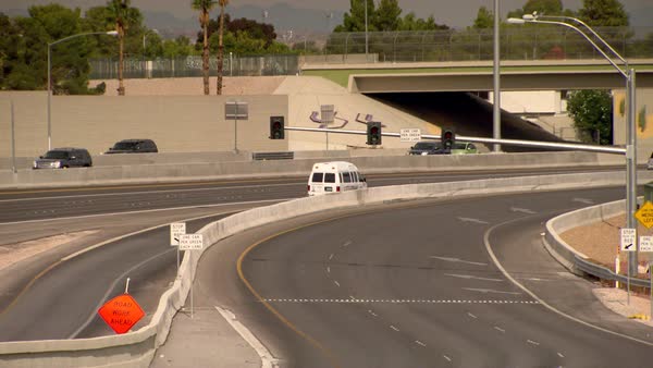 Traffic driving and merging on a freeway during the day. - HD Rights ...