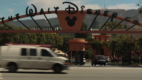 Cars driving through the main gate into the Disney Studios in Burbank ...