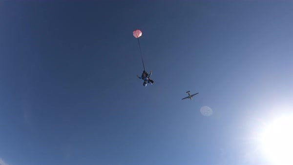 Skydiving. Tandem jump. Barefoot woman. - 4K Royalty-free Stock Video ...