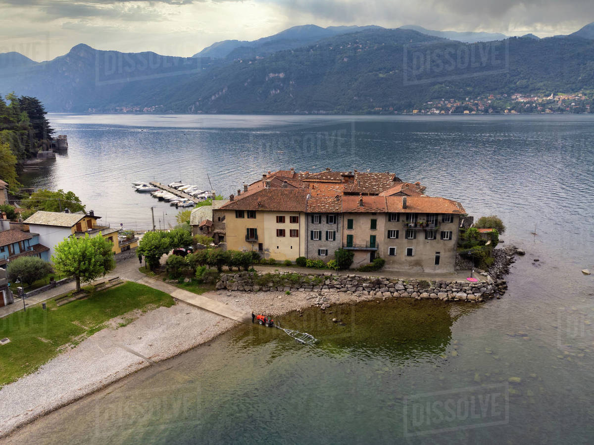 Aerial view of peninsula and village on lake Como, Lierna, Lecco ...