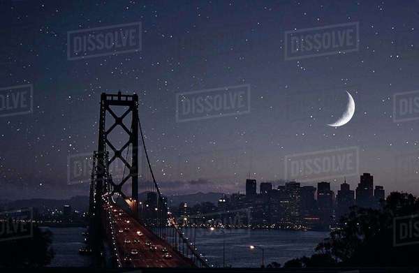 Crescent Moon over Bay Bridge and City Skyline at night, San Francisco ...