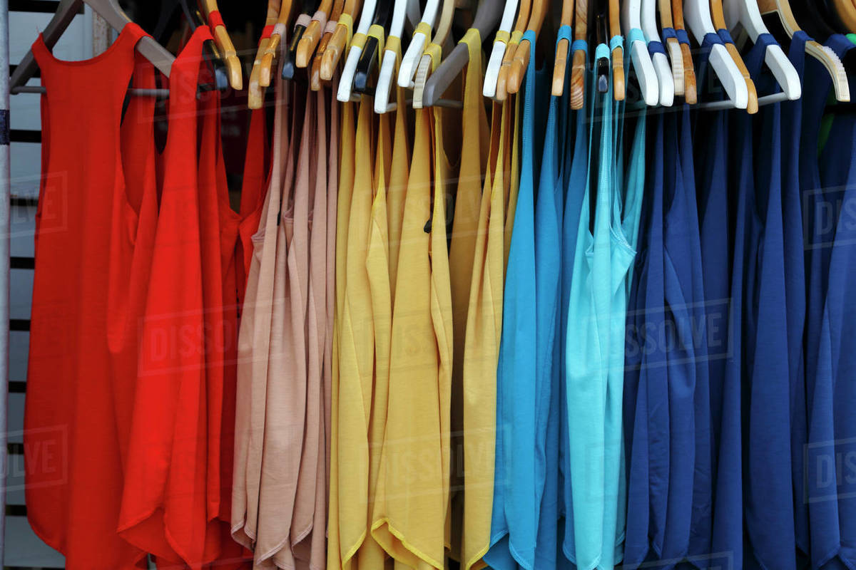 Multi-colored vests hanging in market, Bangkok, Thailand - Royalty-free ...