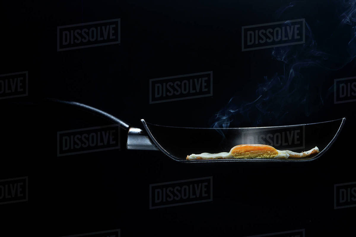 Cross section of a fried egg in a frying pan - Royalty-free Stock Photo ...