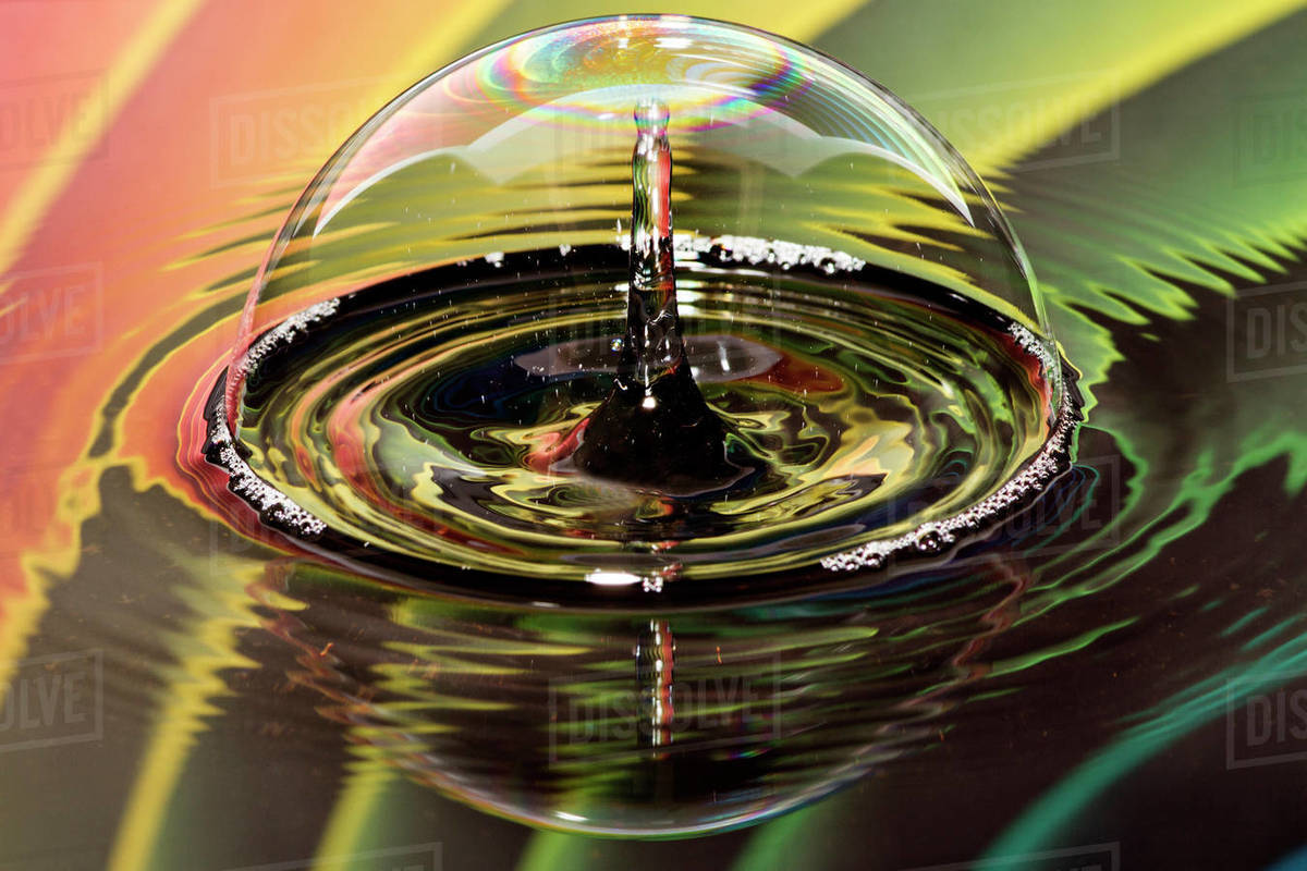 Water drops on a bubble with rainbow background - Royalty-free Stock ...