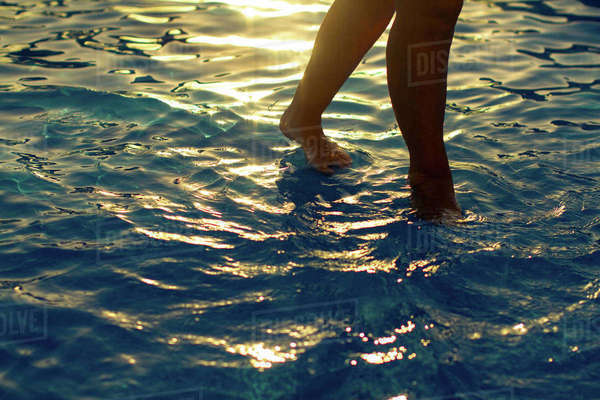 Wading in water - Royalty-free Stock Photo | Dissolve