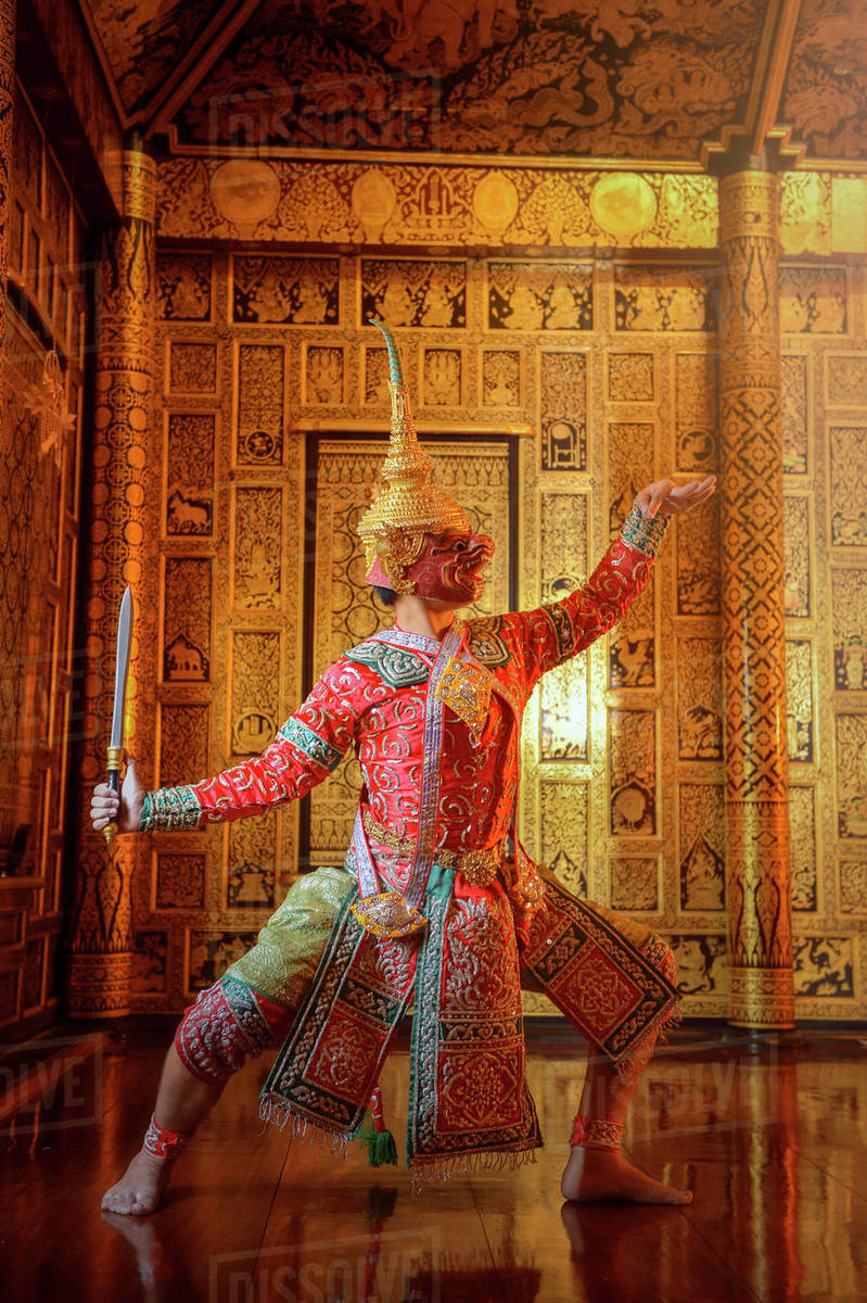 Man performing a Khon dance, Thailand - Stock Photo - Dissolve