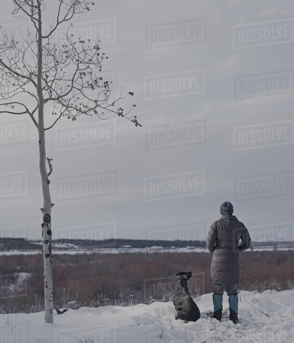 USA, Colorado, Woman with dog - Stock Photo - Dissolve