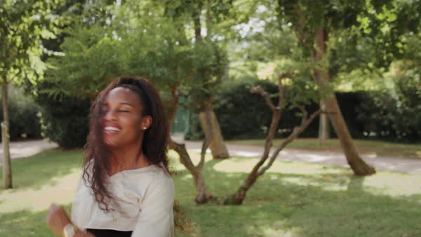 Black woman dancer in park. African American woman dancing hip-hop ...