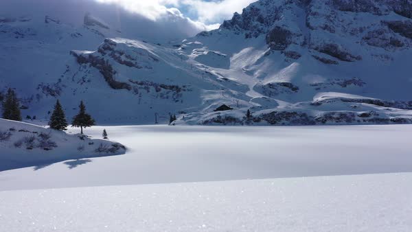 The Swiss Alps in winter. Snow covered mountains - 4K Royalty-free ...