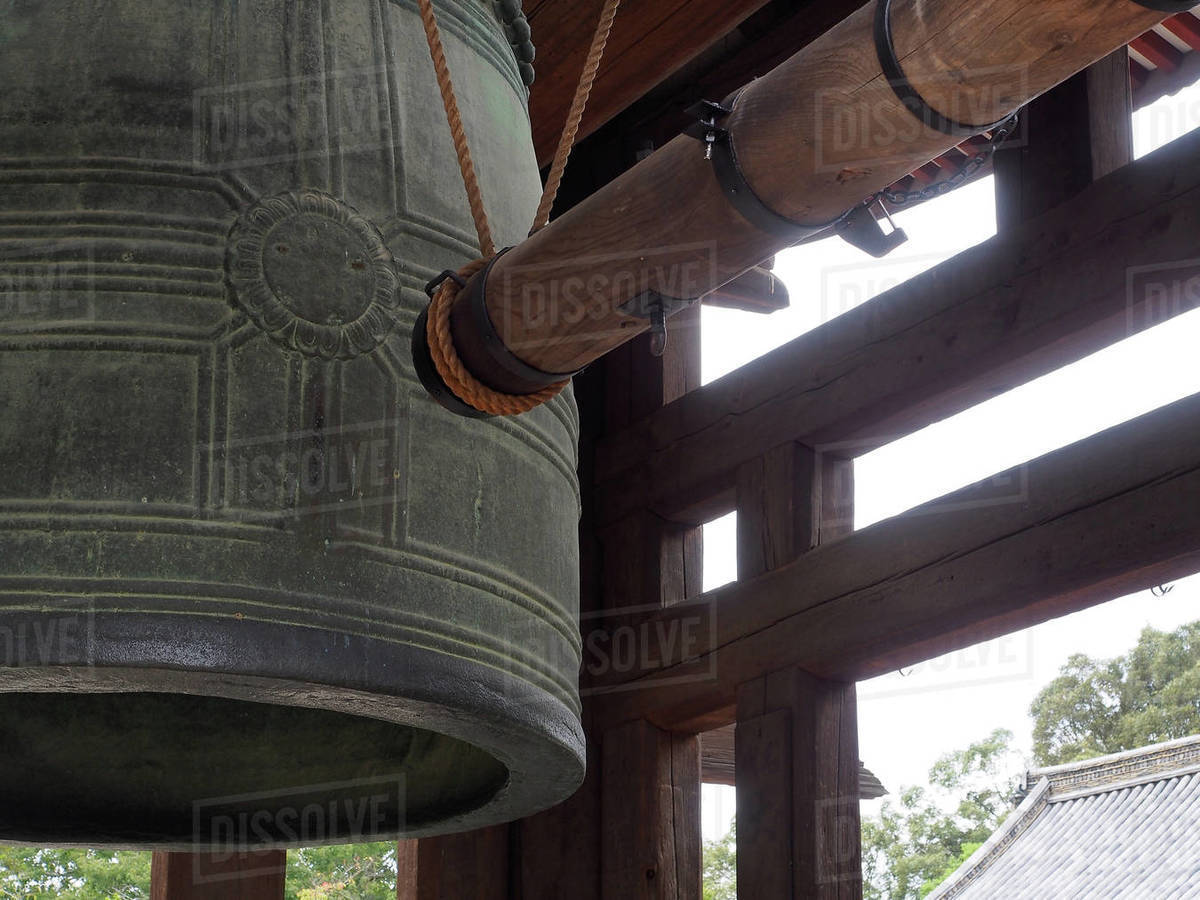 Beautiful temple and bell in park - Stock Photo - Dissolve