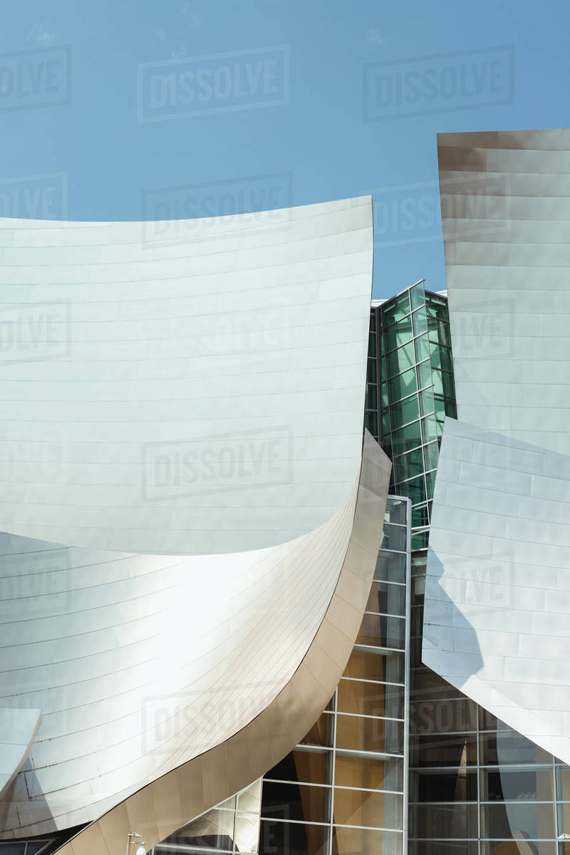 Shiny metal geometrical roof of building in bright day in Los Angeles ...