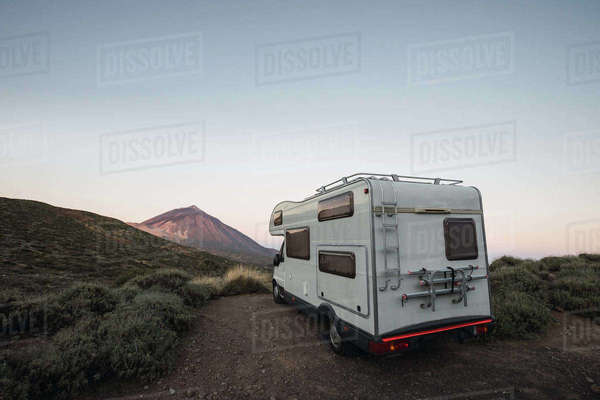 Caravan on roadside in desert landscape on background of beautiful ...