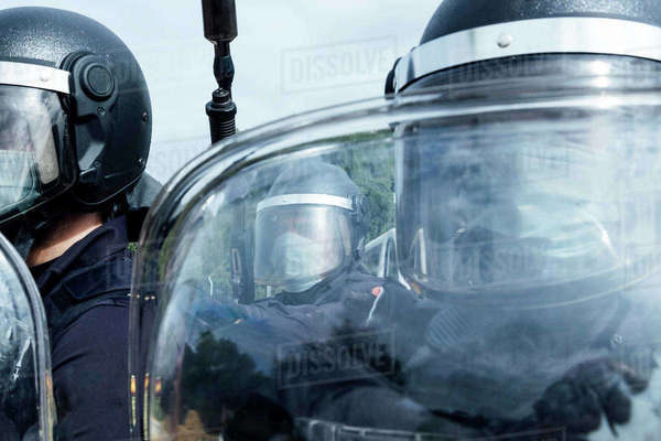 Swat soldiers in protective uniforms and medical masks armed with ...