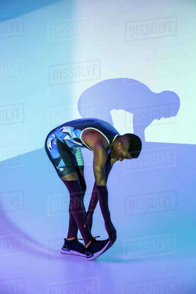 Full body side view of determined professional African American male ...