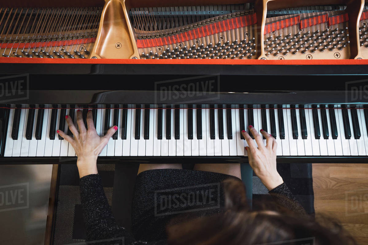 Overhead view of pianist playing piano at home - Royalty-free Stock ...