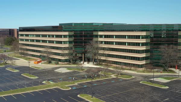 Suburban office buildings and parking lots are closed due to the ...