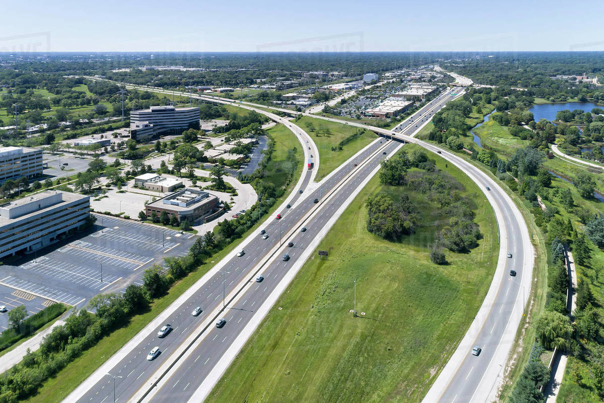 Aerial view of a highways, overpasses, ramps and buildings in a ...