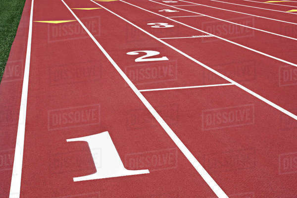 Numbered running lanes on a track with yellow arrows - Royalty-free ...