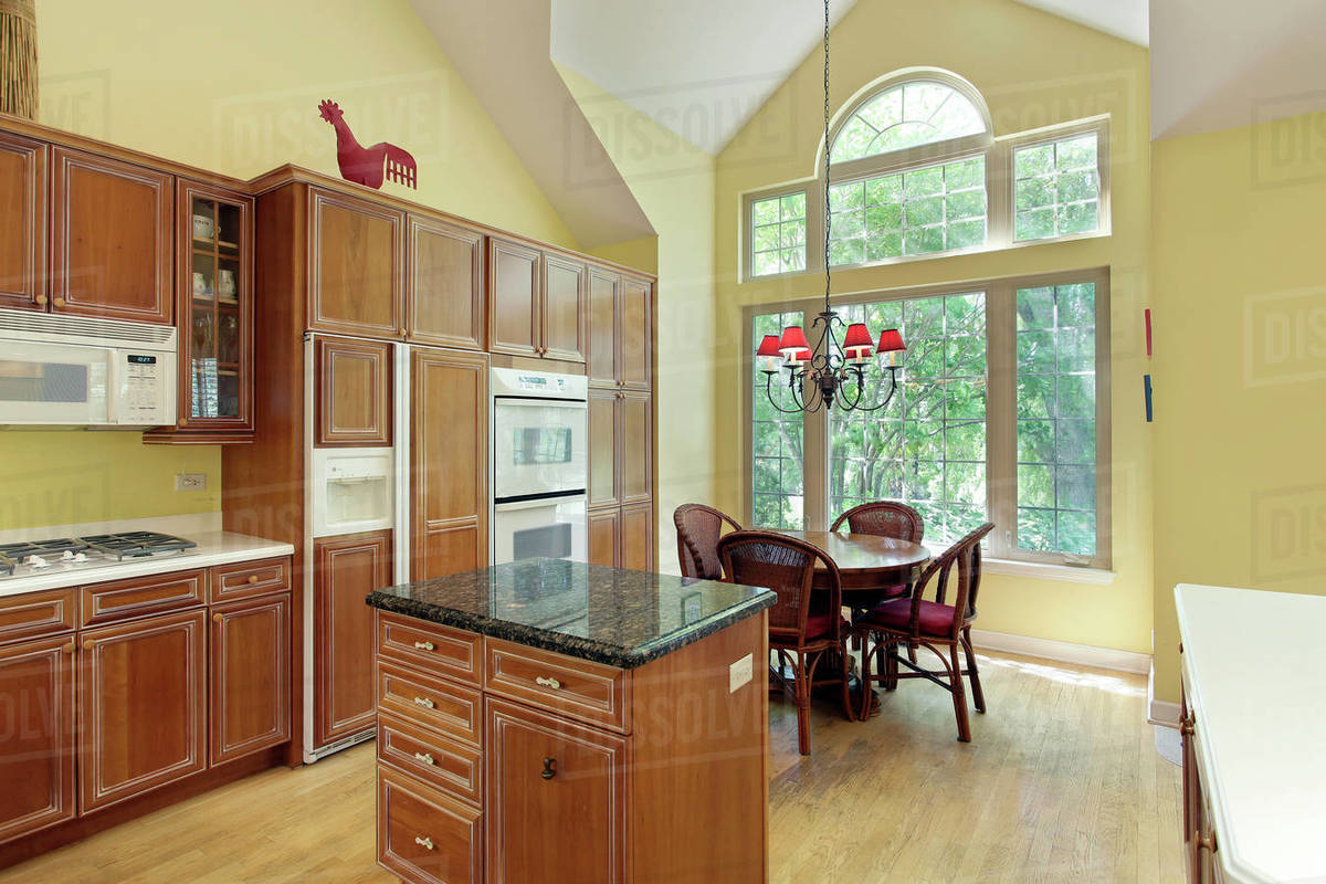 Kitchen in suburban home with eating area. - Royalty-free Stock Photo ...