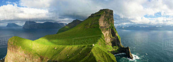Aerial panoramic of Kallur lighthouse, Kalsoy island, Faroe Islands ...