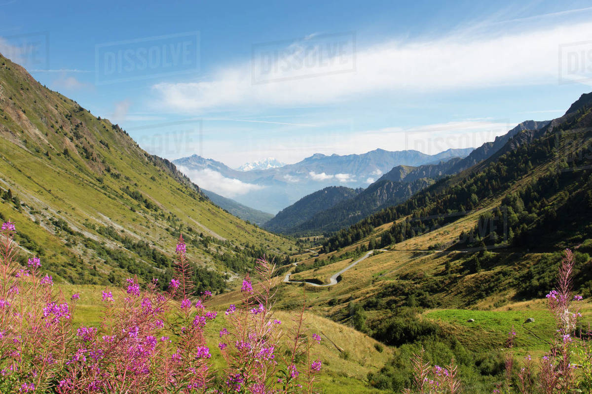 A typical view of the French Alps in the summer, with blue skies, Col ...