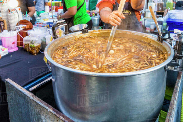 A noodle stall at the famous Walking Street night market in Phuket old ...