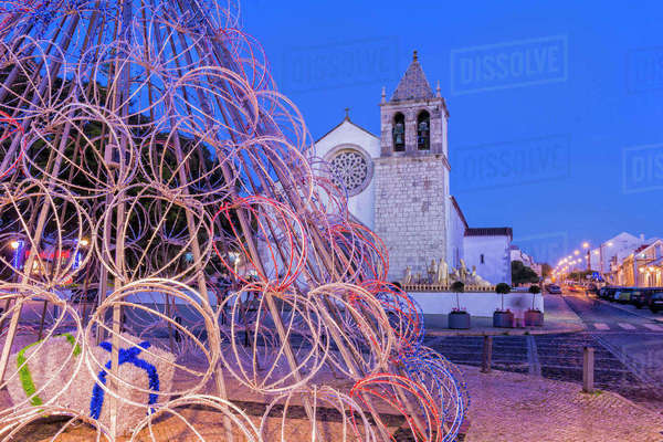 Illuminated modern Christmas tree in front of the Parish Church ...