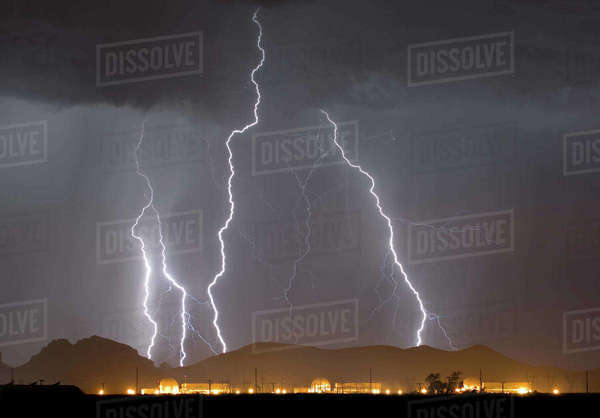 A large lightning storm behind a nuclear power plant in western Arizona ...