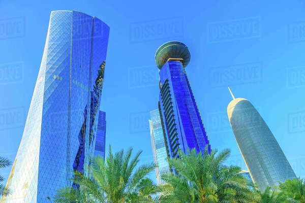 Low angle view of Al Fardan Towers complex and Doha Tower, iconic ...