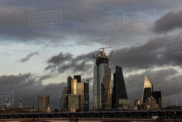 Aeroplane flying over The City of London, London, England, United ...