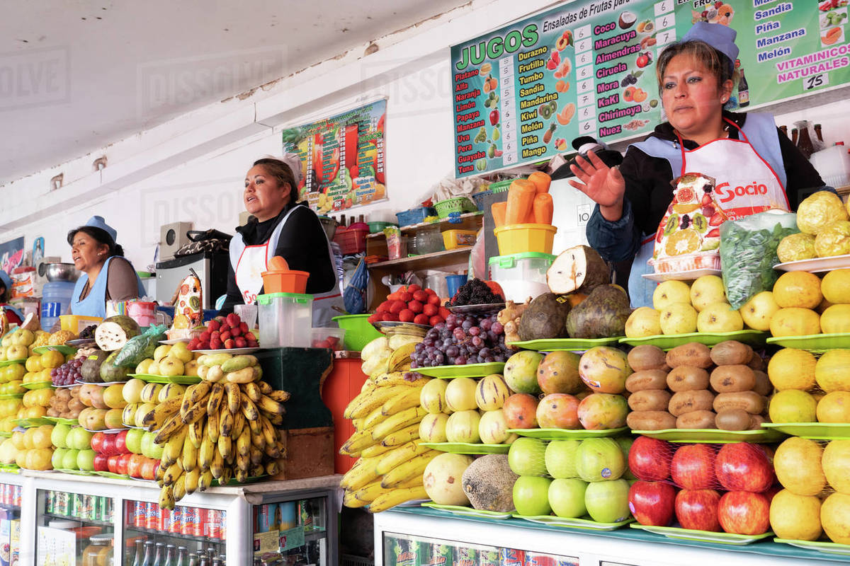 Line up of fruit and juice sellers, main market, Sucre, UNESCO World ...