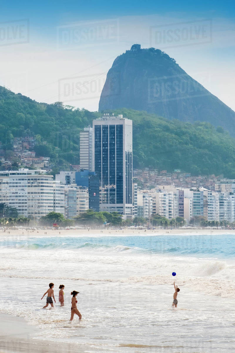 Locals playing ball in the surf, Copacabana Beach, Rio de Janeiro ...