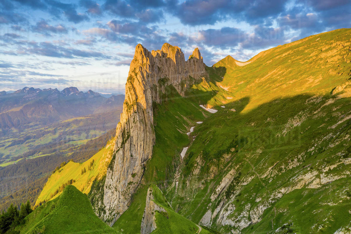 Sunrise on rocky peak of Saxer Lucke mountain in summer, Appenzell ...
