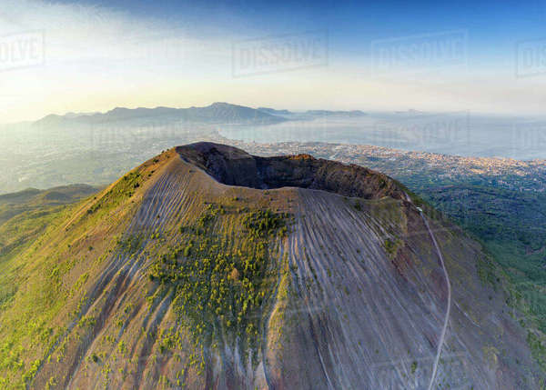 Aerial view of Vesuvius crater and Gulf of Naples at sunrise, Naples ...