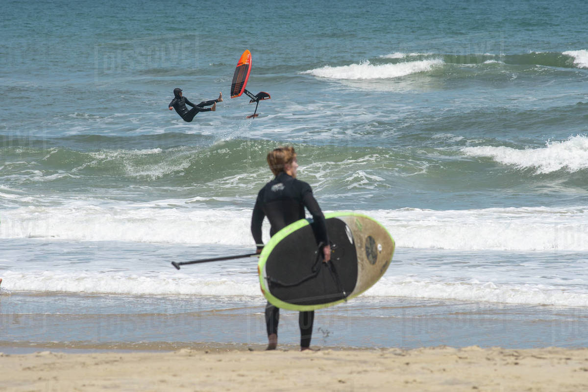 Pro surfer James Jenkins wipes out on his foiling surfboard at Nags ...