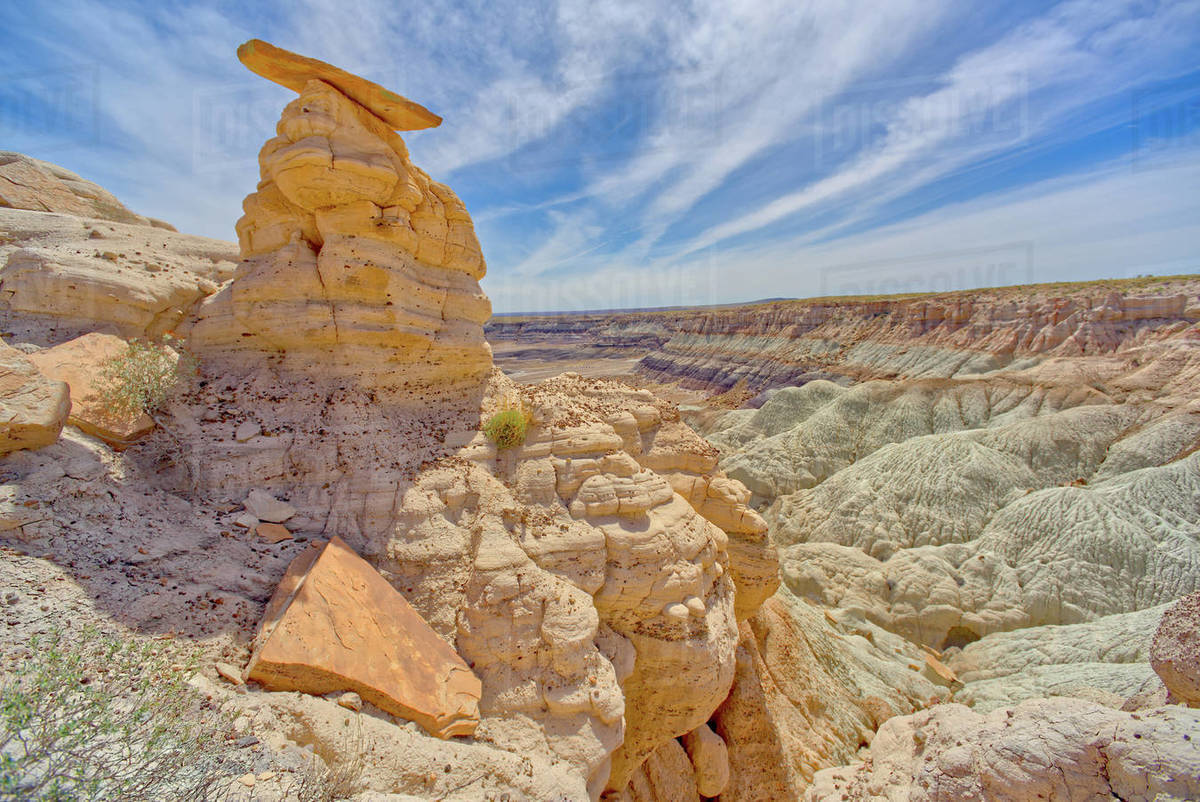 Flat top hoodoo on the edge of a cliff along the Billings Gap Trail on ...