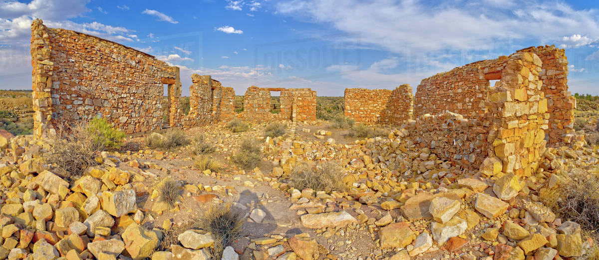 The crumbling stone walls of a derelict building in the ghost town of ...
