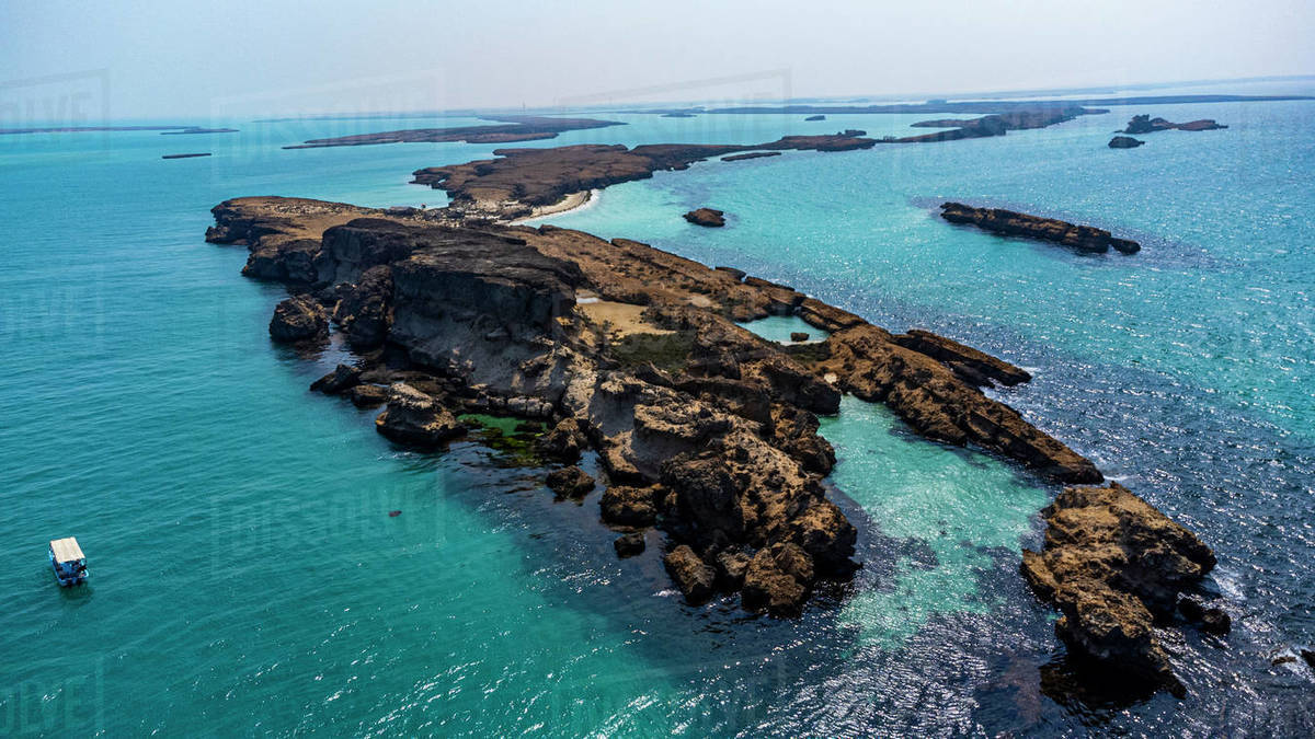Aerial of a little boat in the Farasan islands, Kingdom of Saudi Arabia ...