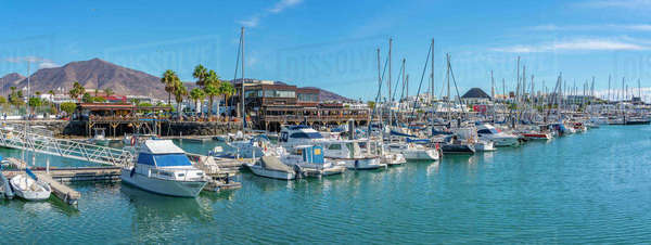 View of restaurant and boats in Rubicon Marina, Playa Blanca, Lanzarote ...