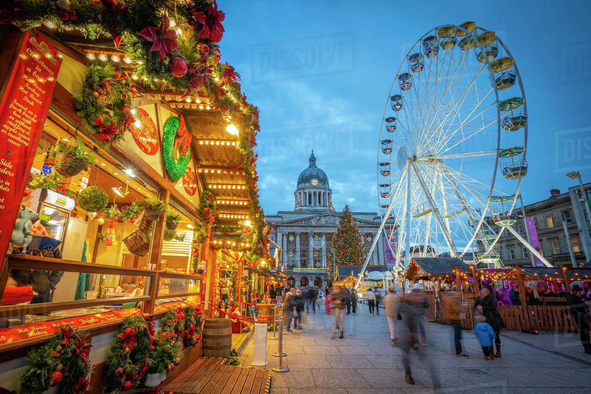 View of Christmas market stalls, ferris wheel and Council House on Old ...
