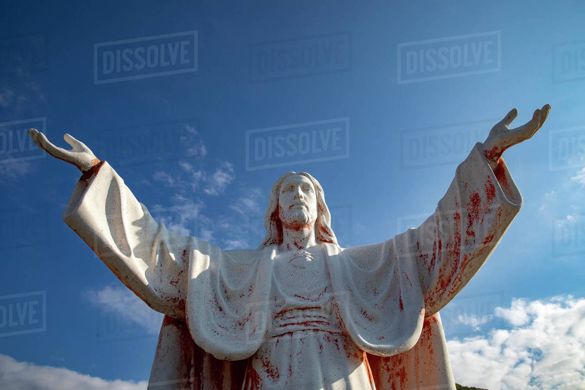 Statue of Jesus Christ with open arms in Delaj, Montenegro, Europe ...