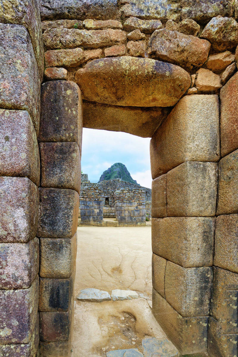 Machu Picchu, UNESCO World Heritage Site, gate in the ruined city of ...