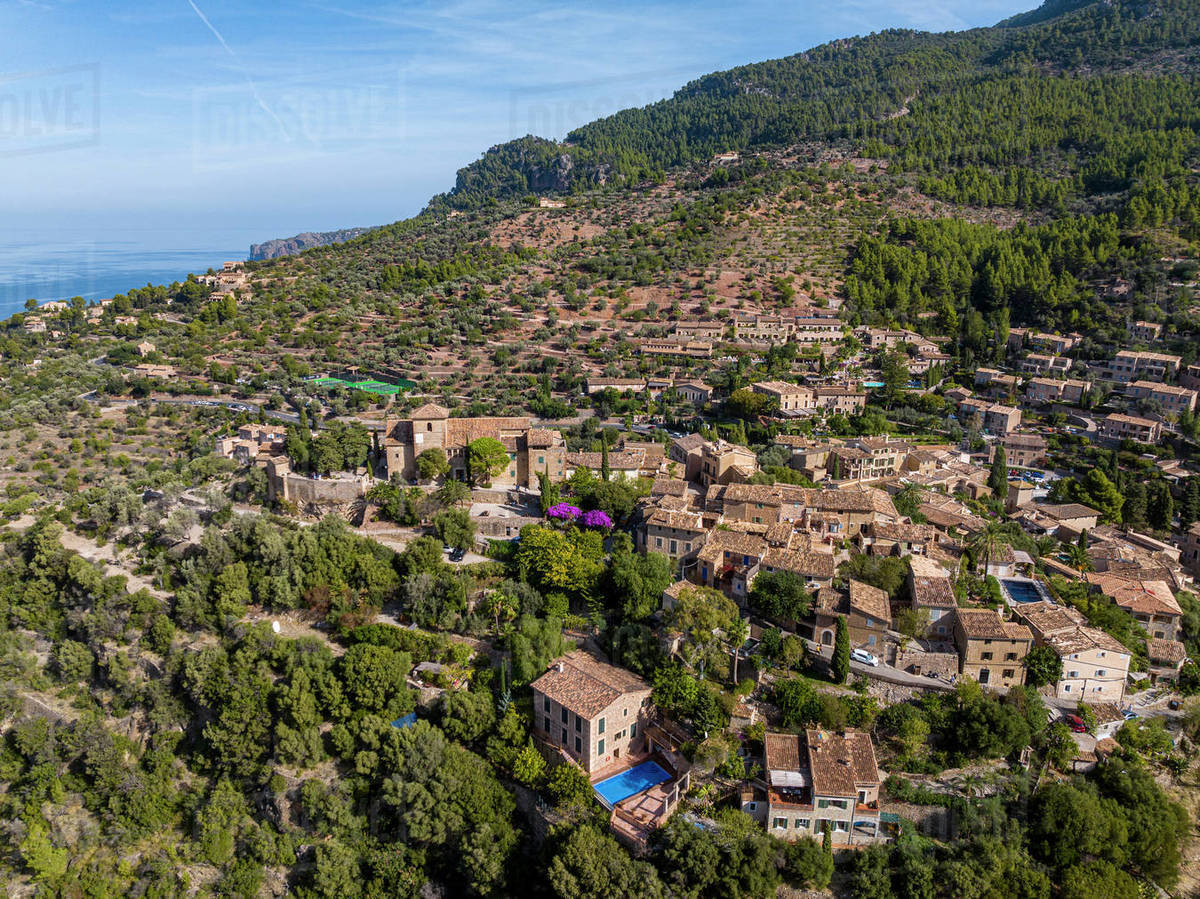 Aerial of the mountain village of Deia, Serra de Tramuntana, UNESCO ...