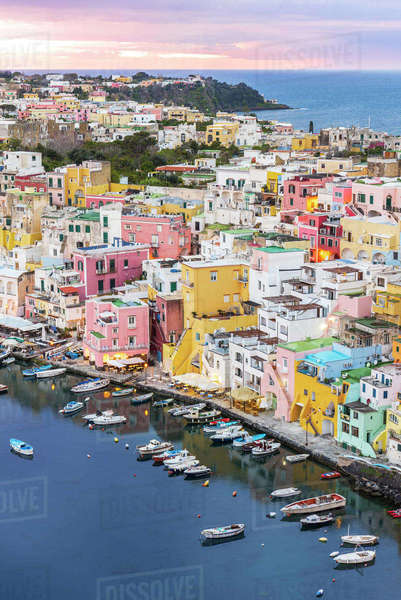 Elevated view of the fishing village of Marina Corricella with colorful ...