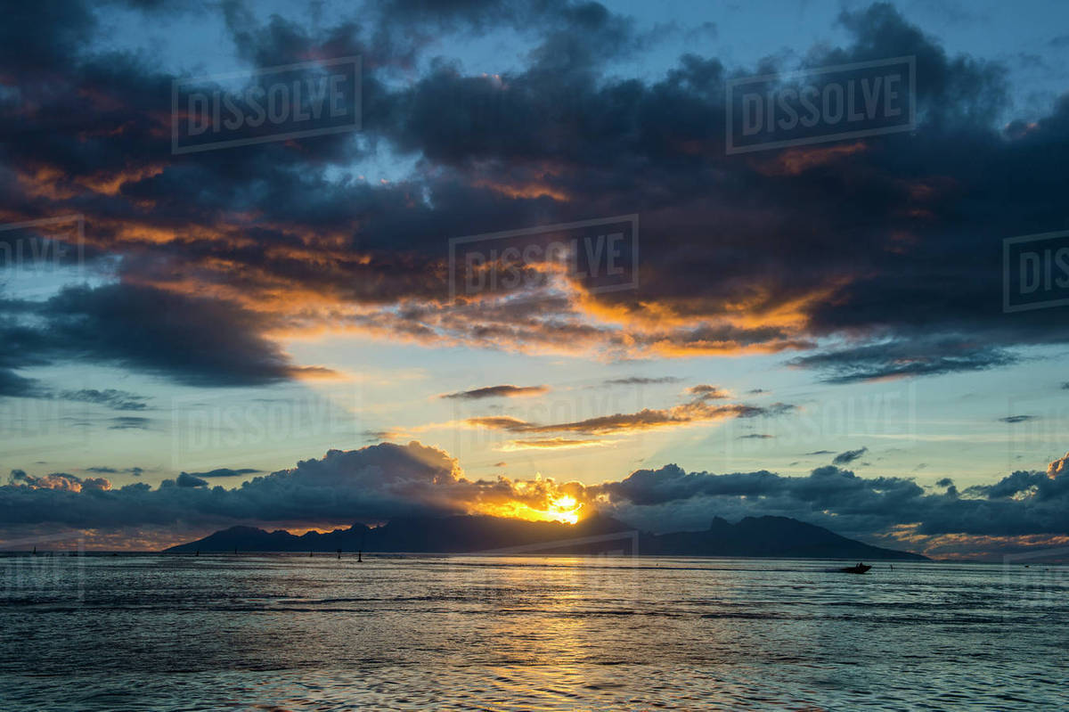Dramatic sunset over Moorea, Papeete, Tahiti, Society Islands, French ...