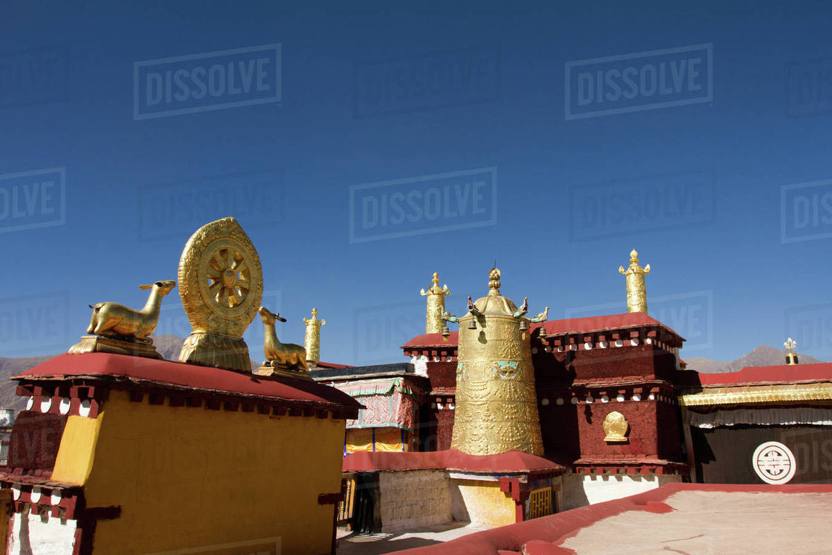Golden rooftops of the Jokhang Temple of Barkhor Square, Lhasa, Tibet ...