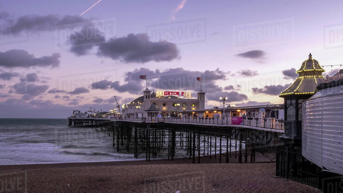 A sunset shot of brighton pier at brighton beach, england - Royalty ...
