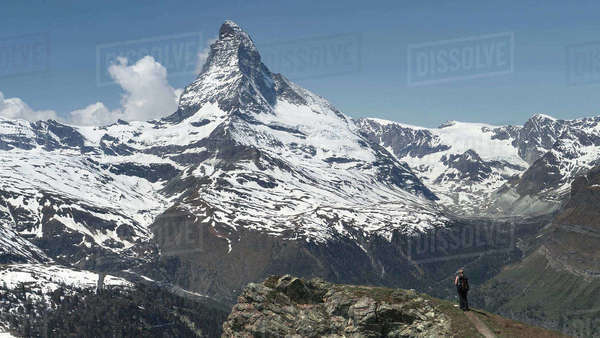 wide angle shot of the matterhorn mountain on a spring morning at ...